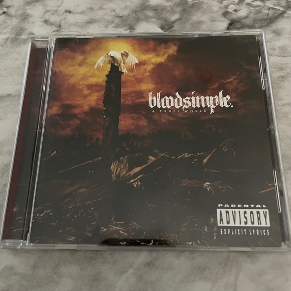 Bloodsimple | Media | Bloodsimple A Cruel World Cd | Poshmark
